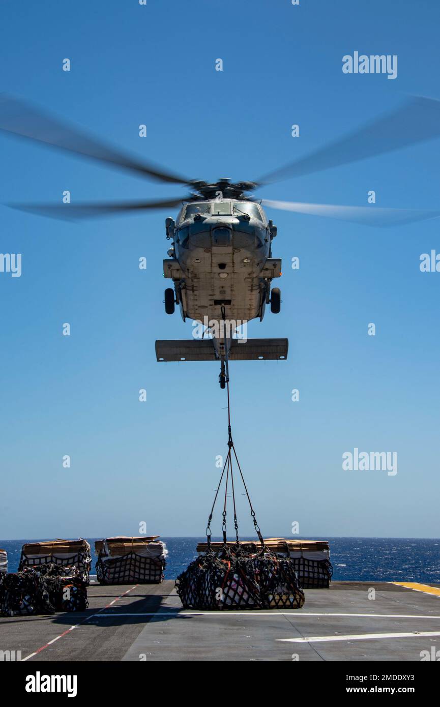 PACIFIC OCEAN (July 22, 2022) An MH-60S Sea Hawk helicopter, attached ...