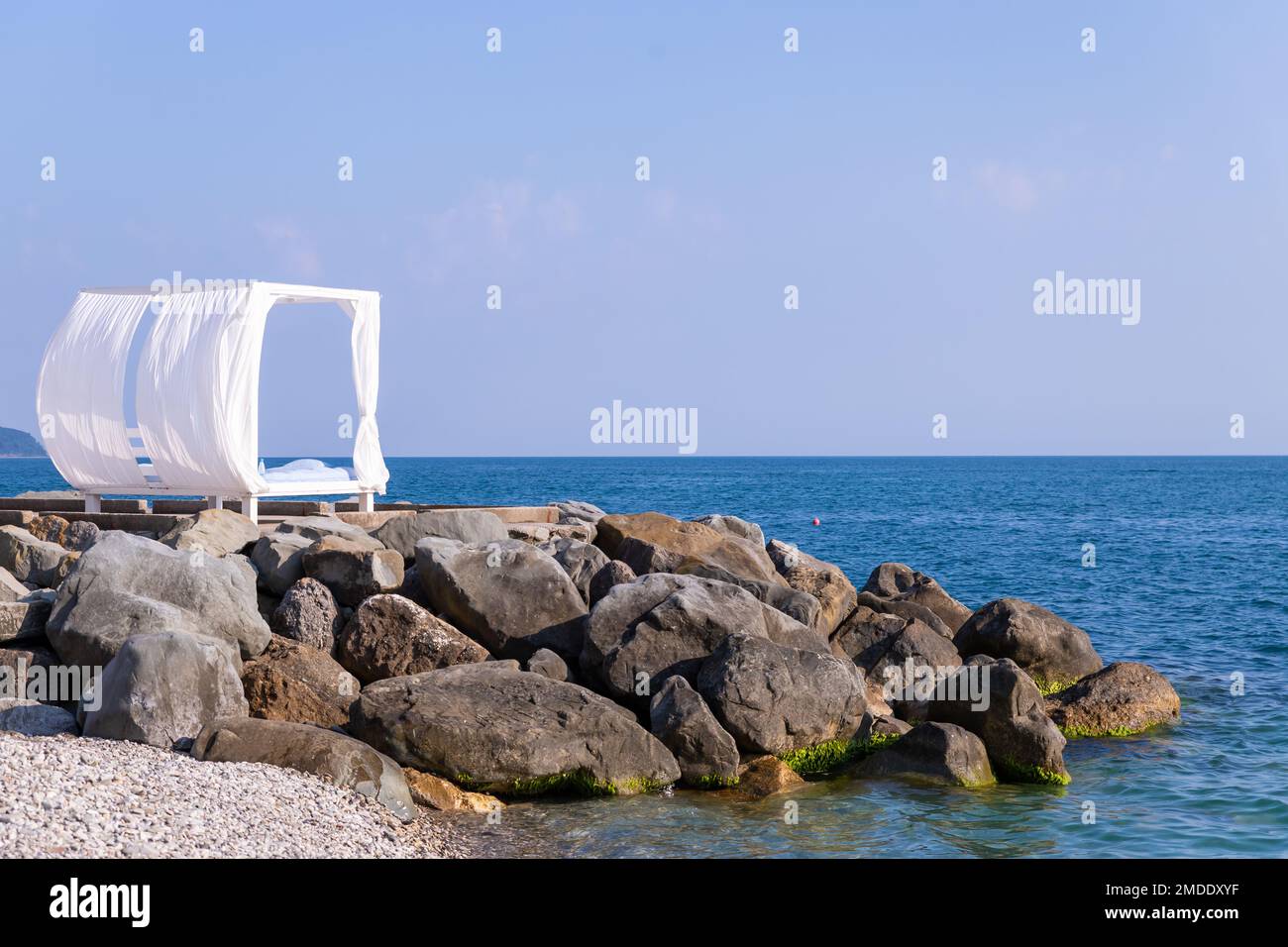 Scenic view empty white beach wooden canopies cabanas with white ...