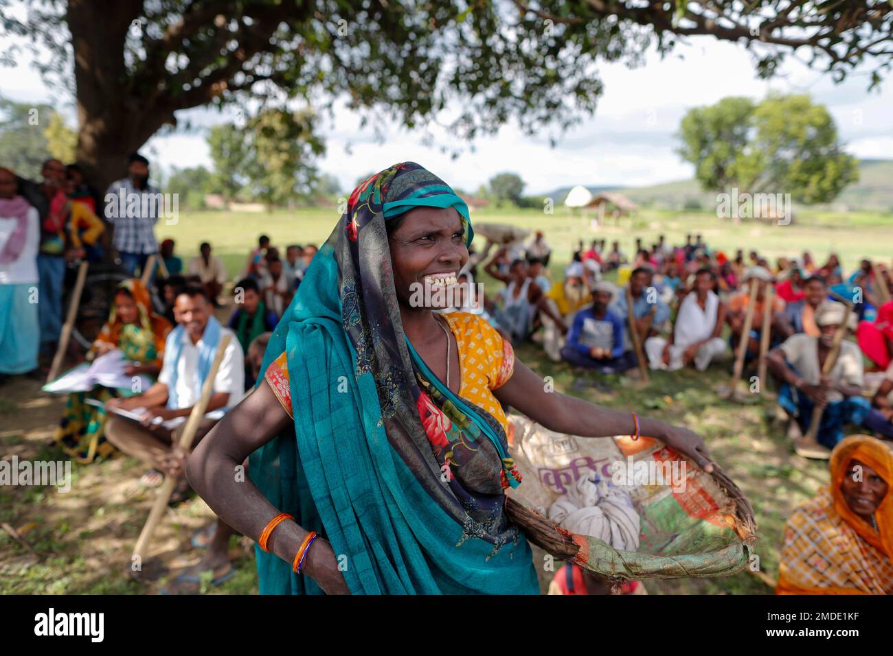 Laborers engaged under a government program that guarantees 100 days of ...