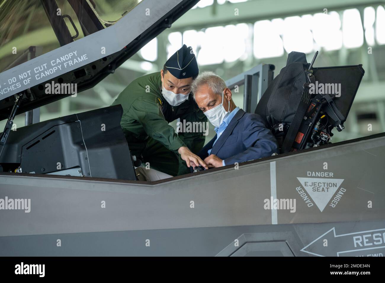 Japan Air Self-Defense Force (JASDF) Lt. Col. Yoshihiko Ida, left ...