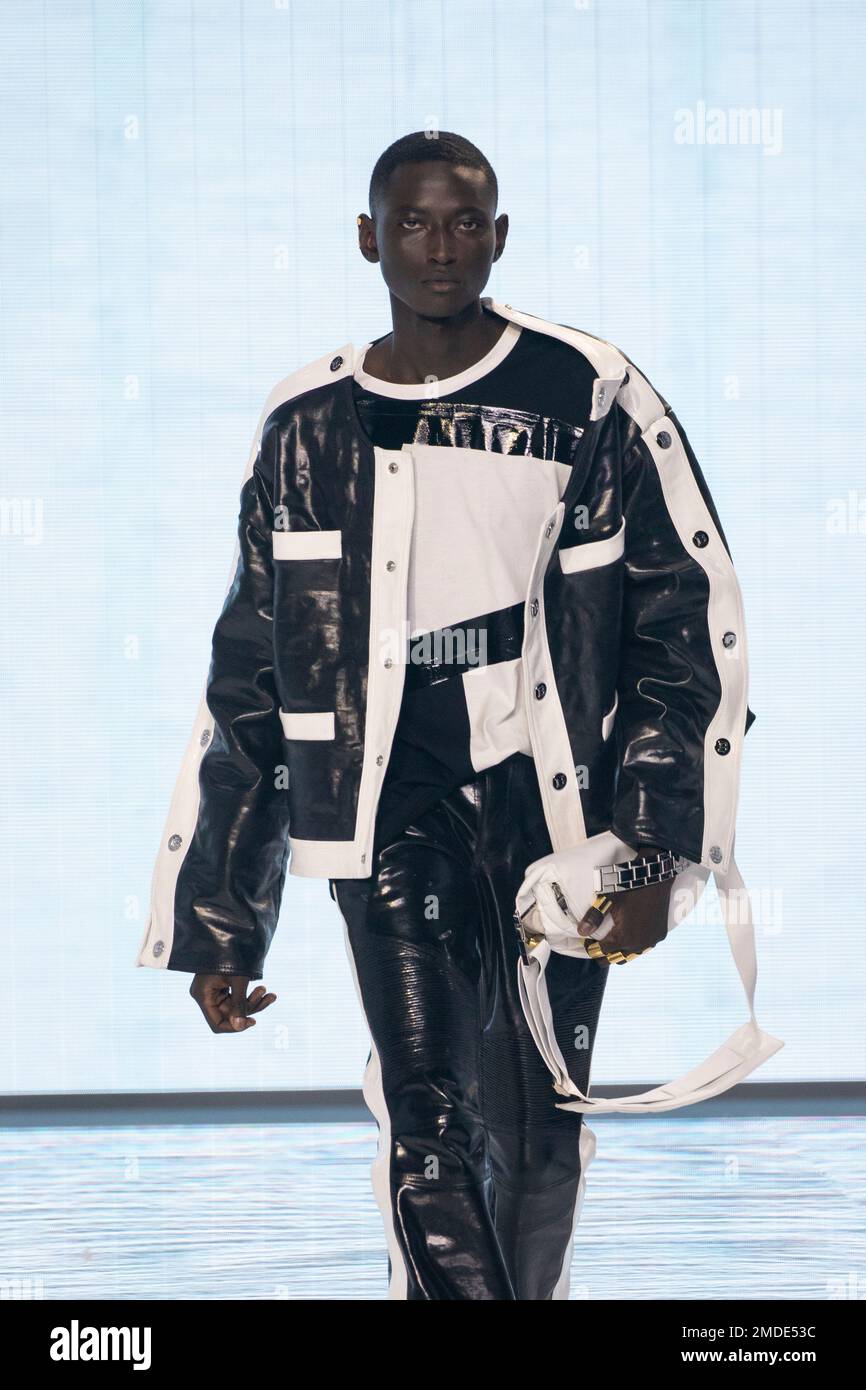 A model wears a creation for the Balmain Spring-Summer 2022 ready-to ...