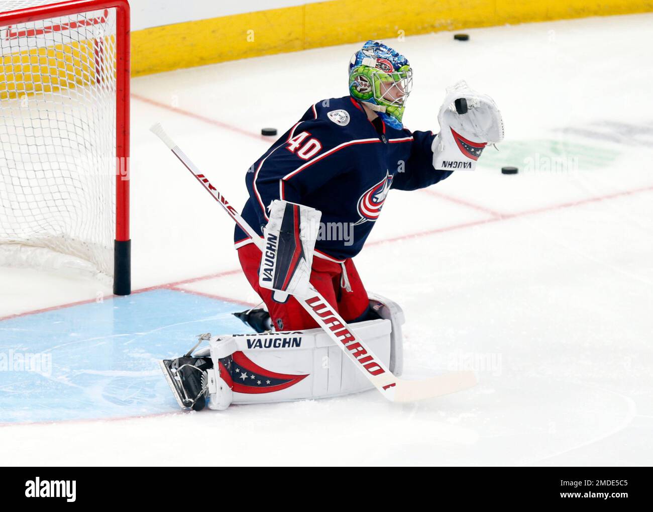 Columbus Blue Jackets goalie Daniil Tarasov stops a shot during warm ...