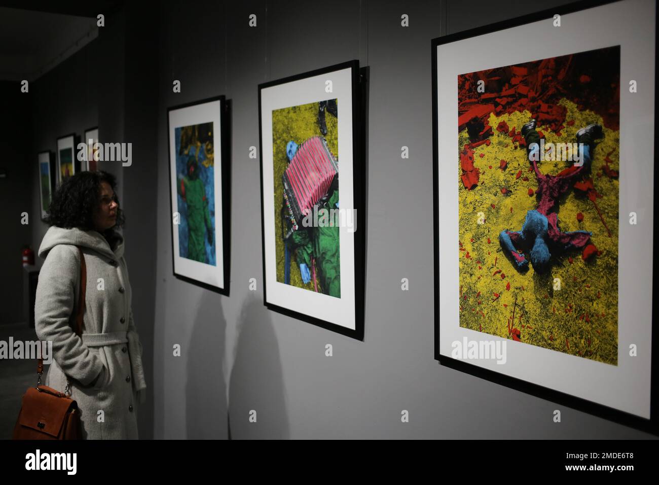 Odessa, Ukraine. 22nd Jan, 2023. A woman looks at digital collages by ...