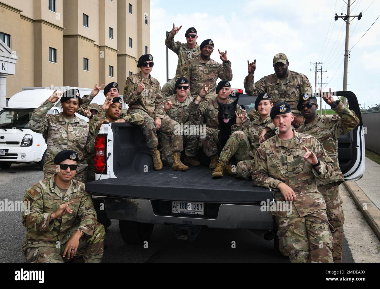 Defenders with the 8th Security Forces Squadron take a group photo with ...