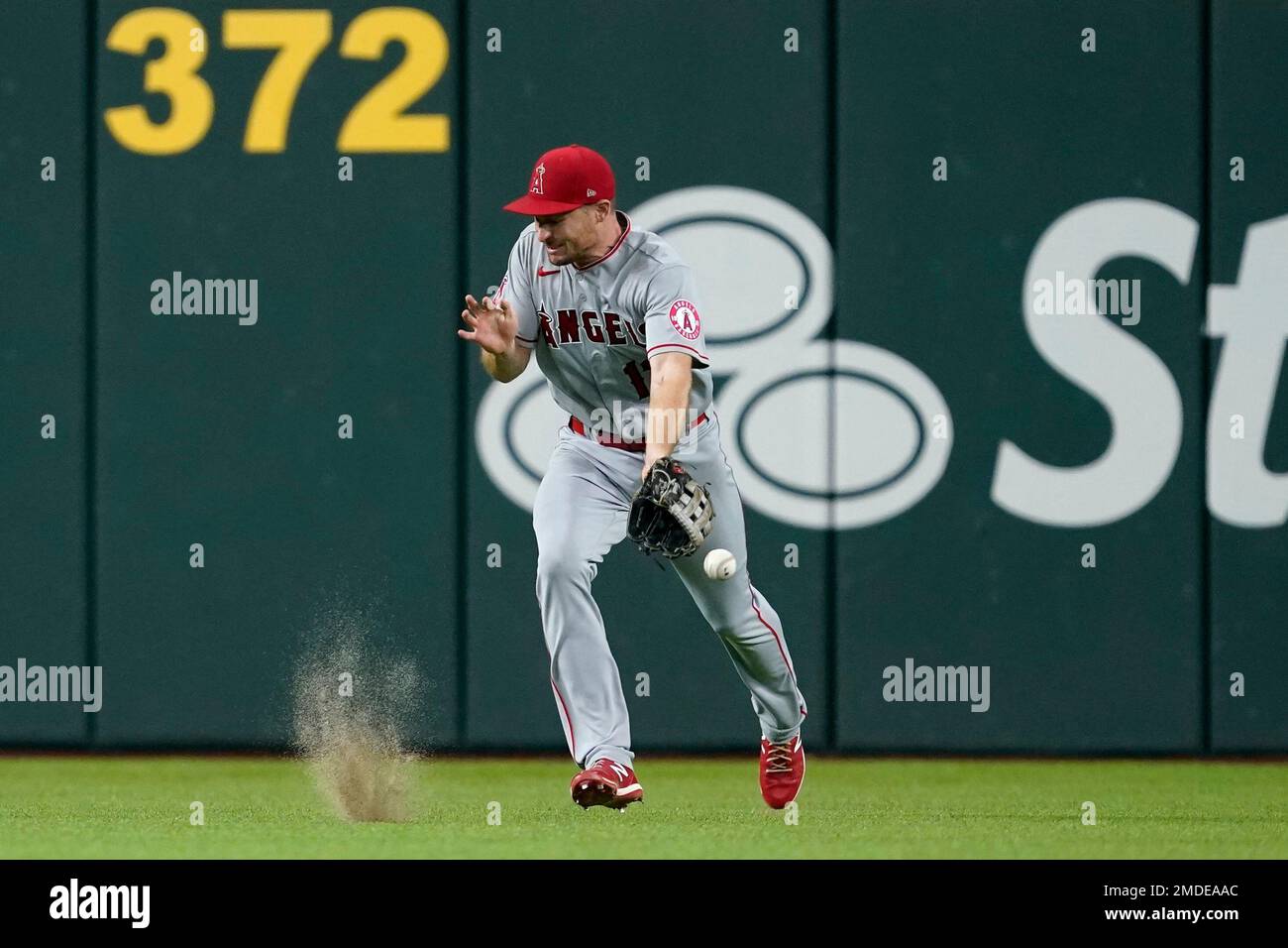 Los Angeles Angels center fielder Brandon Marsh misses trying to reach ...