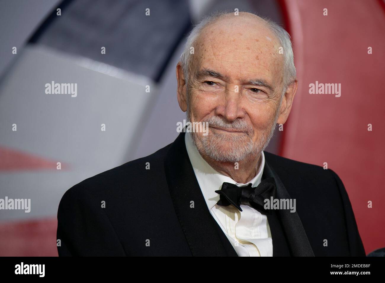 Michael G. Wilson poses for photographers upon arrival for the World ...