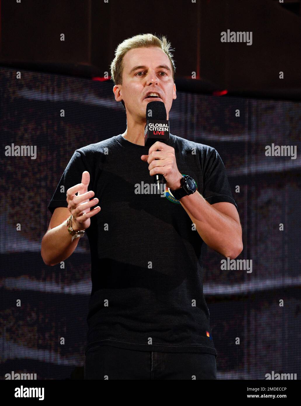 Global Citizen co-founder and CEO Hugh Evans performs at Global Citizen ...