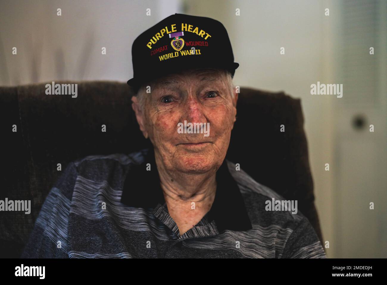Richard Russell, a World War II Marine veteran, poses for a photo ...