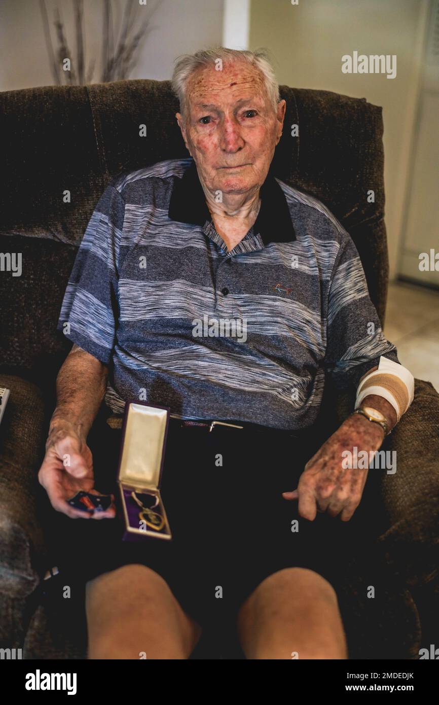 Richard Russell, a World War II Marine veteran, poses for a photo ...