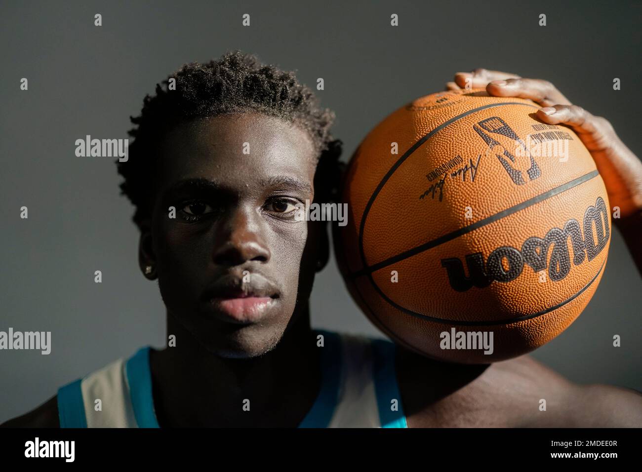 Charlotte Hornets' JT Thor poses for a picture during media day Monday ...