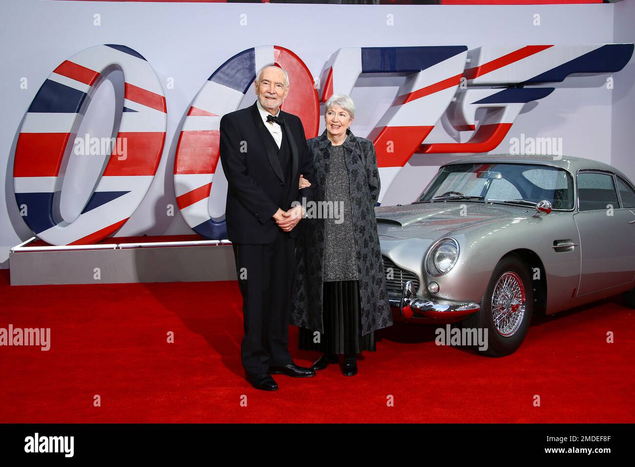 Michael G. Wilson and Jane Wilson pose for photographers upon arrival ...