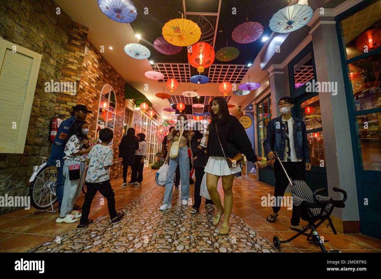 Malang, Indonesia. 22nd Jan, 2023. Visitors to the shopping center can ...