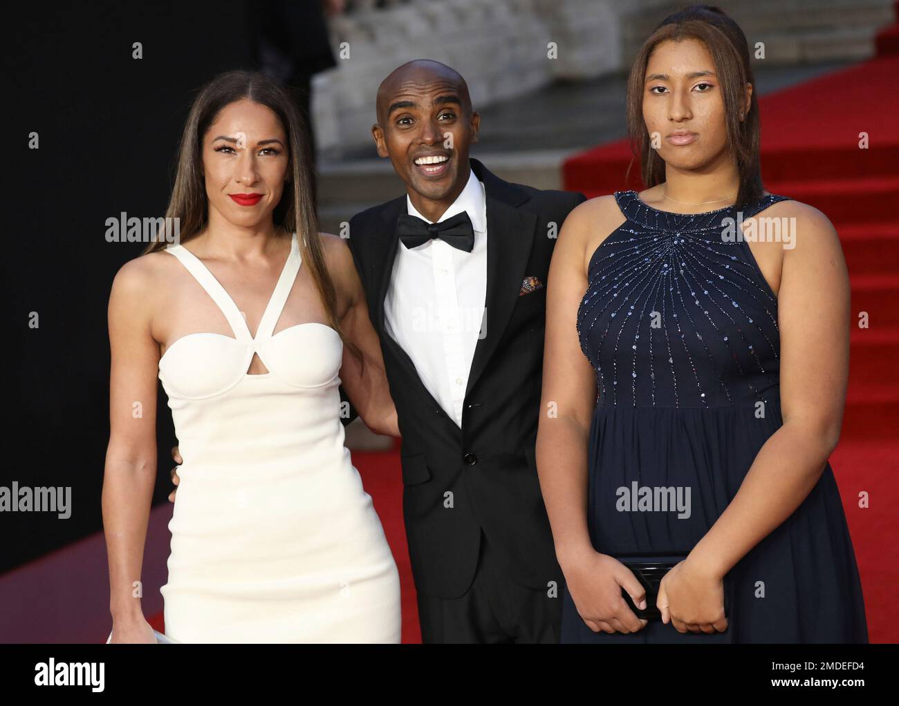 Tania Nell, Sir Mo Farah and Rhianna Farah pose for photographers upon ...