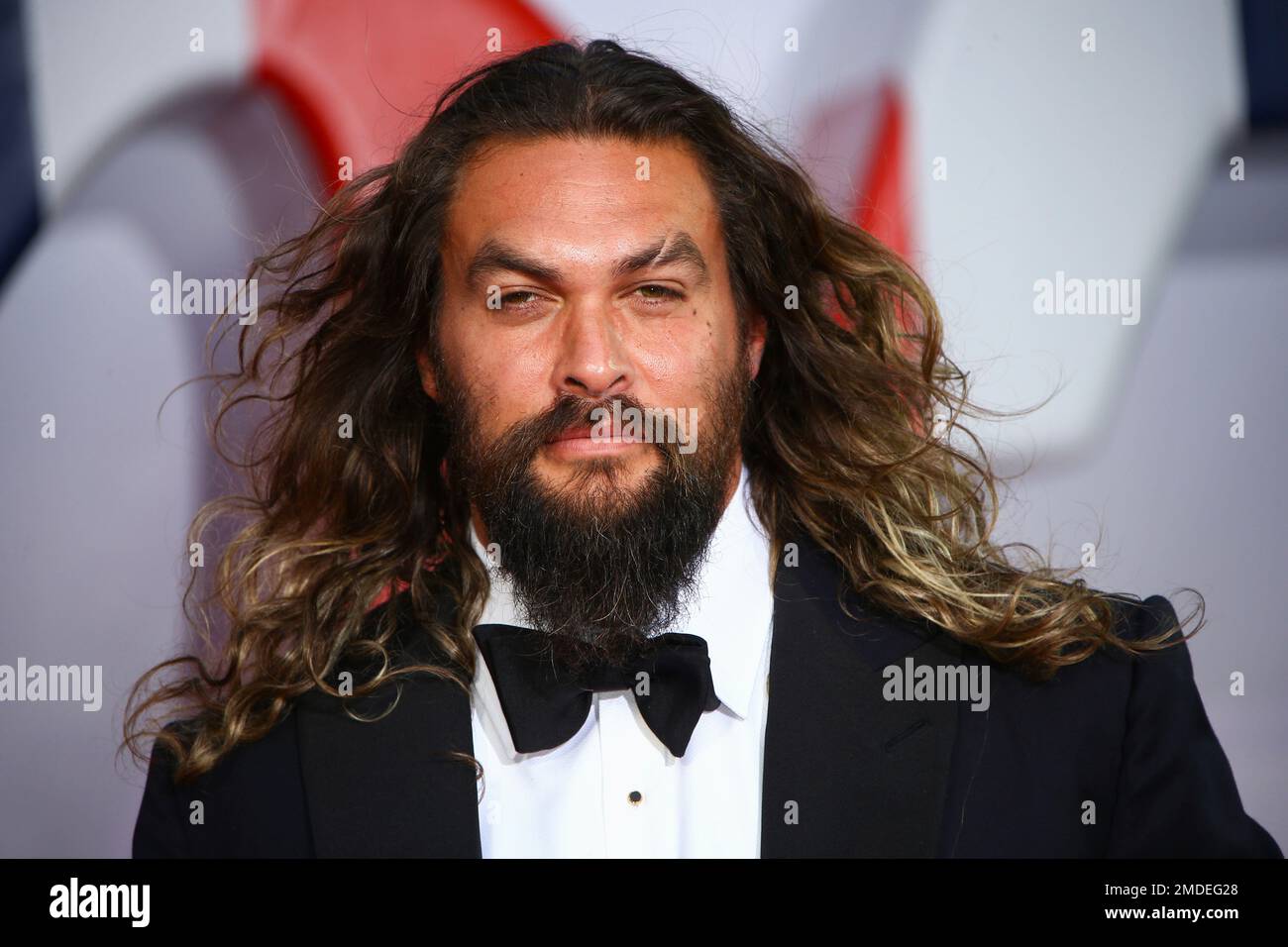 Jason Momoa poses for photographers upon arrival for the World premiere ...