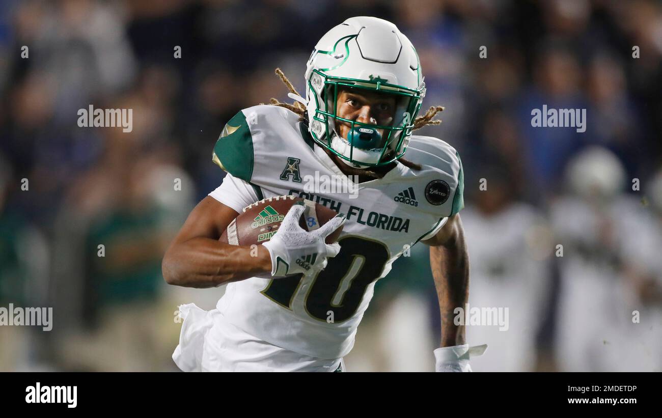 South Florida wide receiver Xavier Weaver runs the ball in the first ...