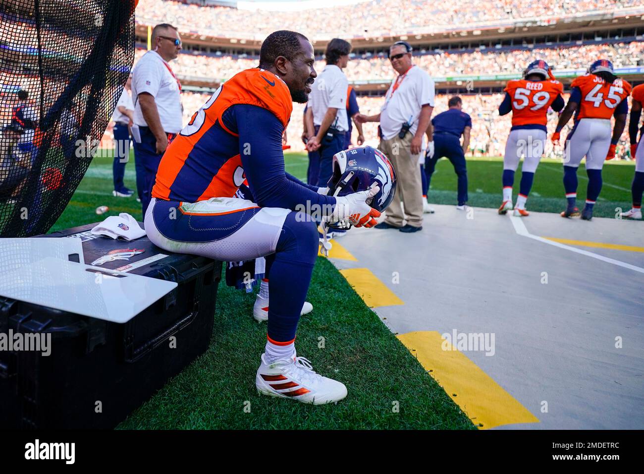 Denver Broncos outside linebacker Von Miller (58) sits on the sidelines ...
