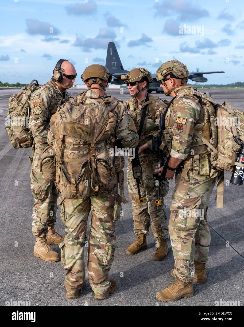 Members from the 23rd Security Forces Squadron coordinate to take up ...