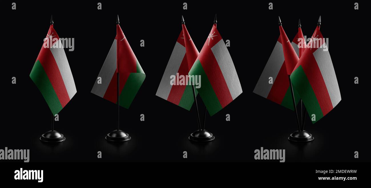 Small national flags of the Oman on a black background Stock Photo - Alamy