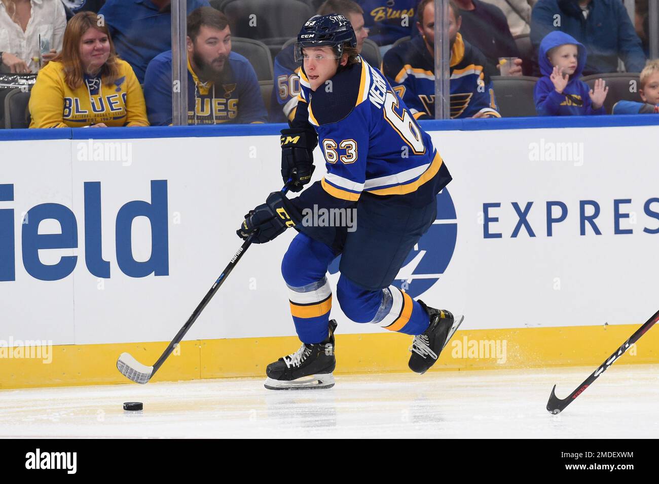 St. Louis Blues' Jake Neighbours (63) handles the puck against the ...