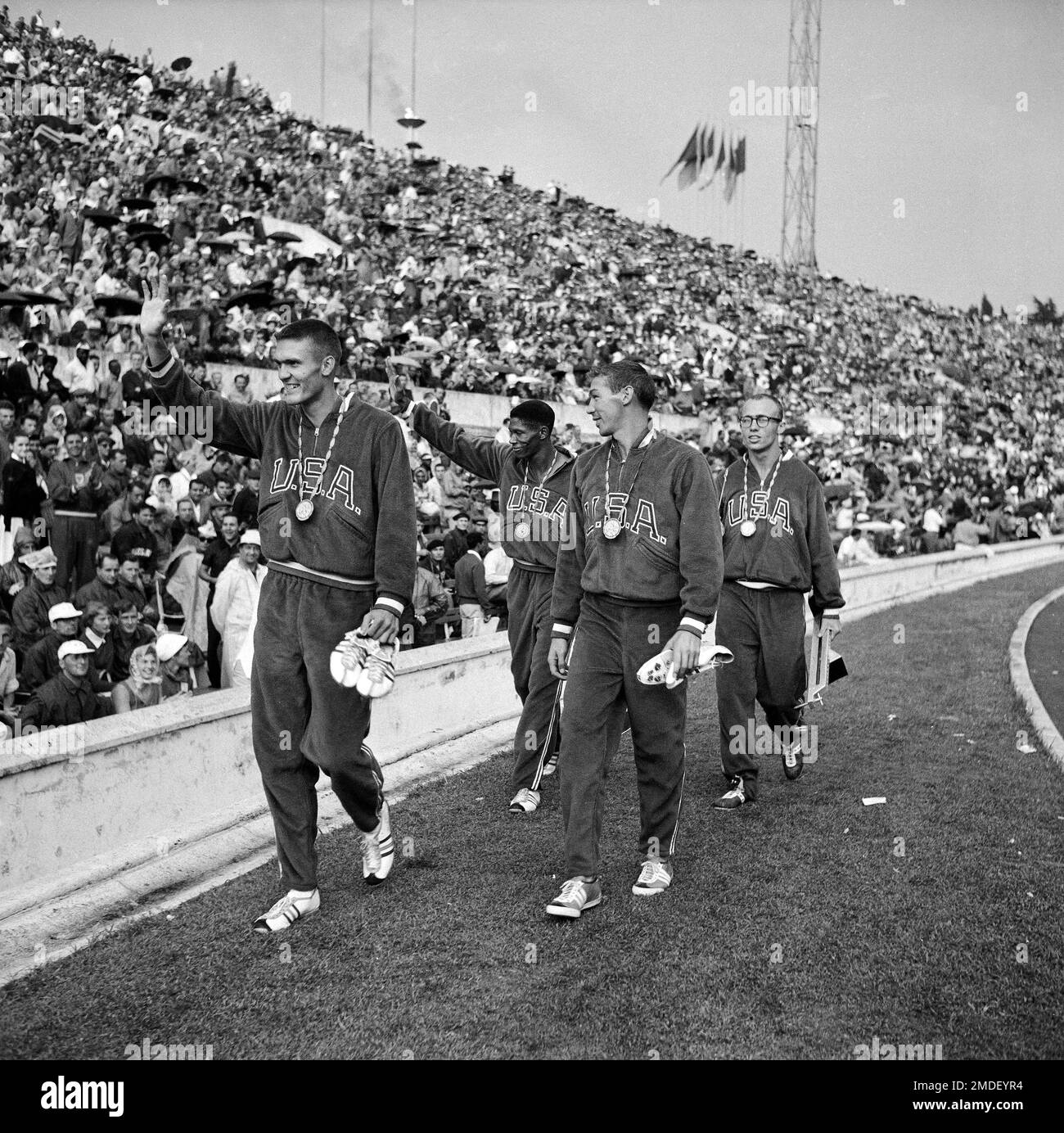 Members of the U.S. 1,600-meter relay team, which won Olympic gold at ...