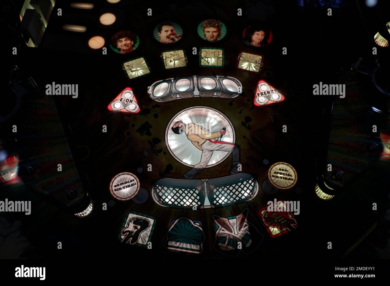 A pinball machine featuring the faces of members of the British iconic ...