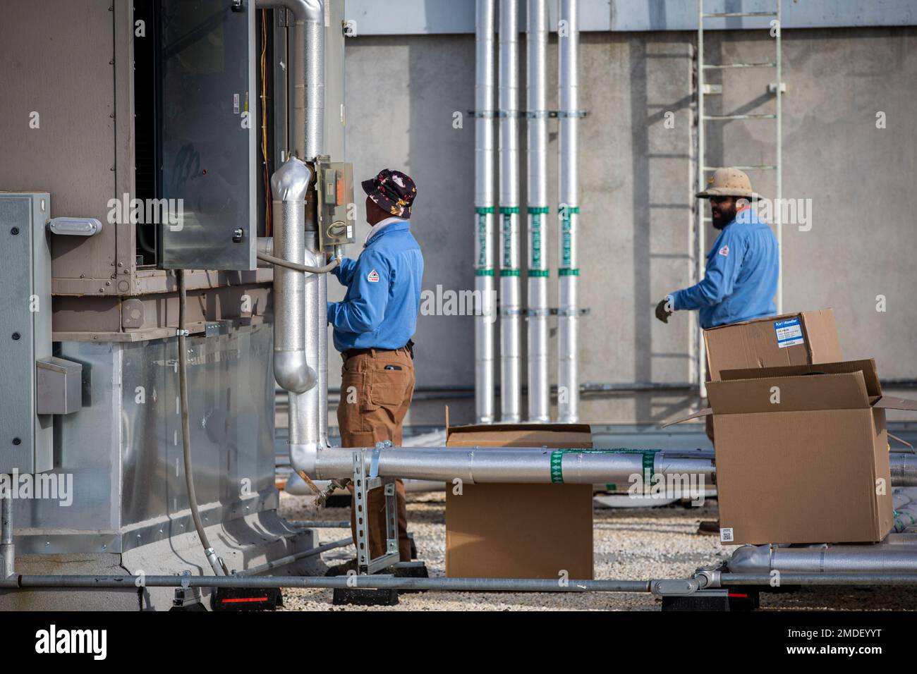 Bruce Kernan (left) and Isaac Solorio (right), heating, ventilation ...