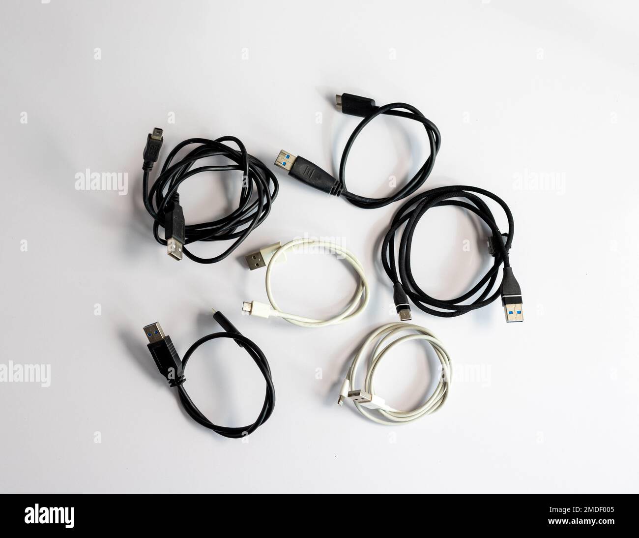 Used charging cables for electronic devices Stock Photo - Alamy