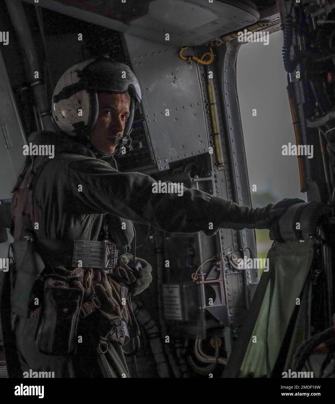 A U.S. Marine Corps crew chief assigned to Marine Heavy Helicopter ...