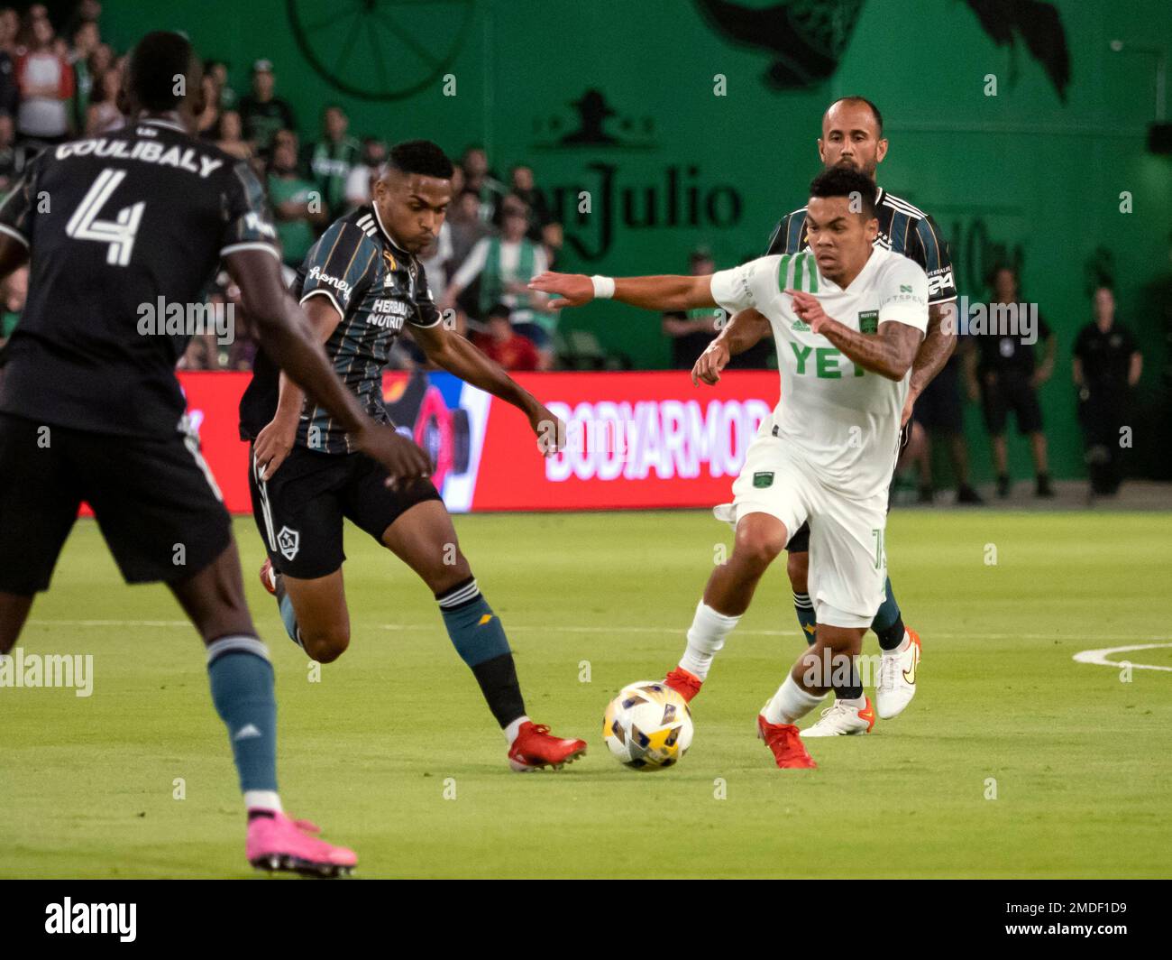 Austin FC midfielder Daniel Pereira, right, drives toward the goal ...