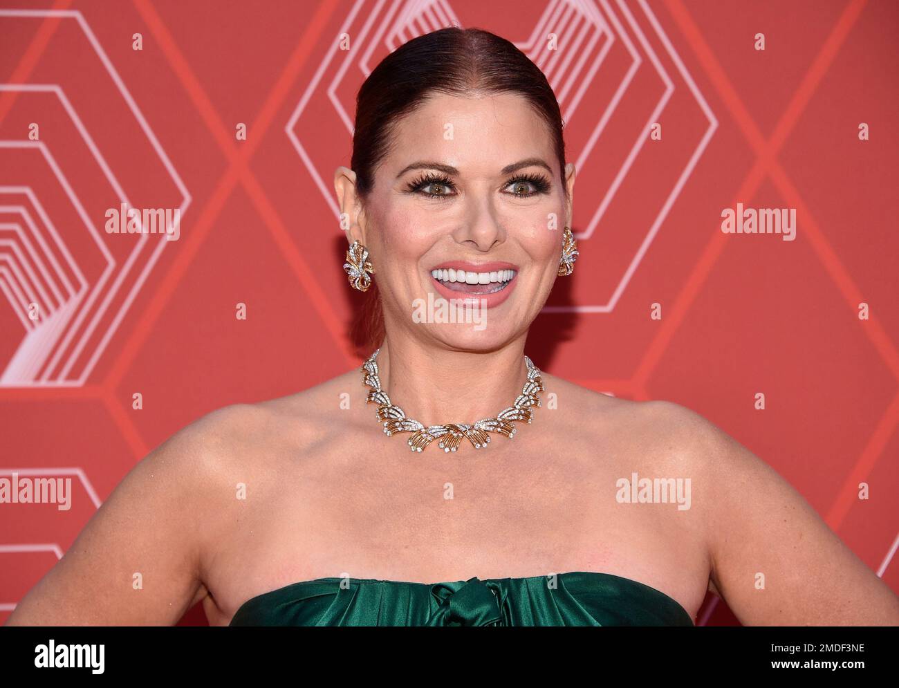 Debra Messing arrives at the 74th annual Tony Awards at Winter Garden ...