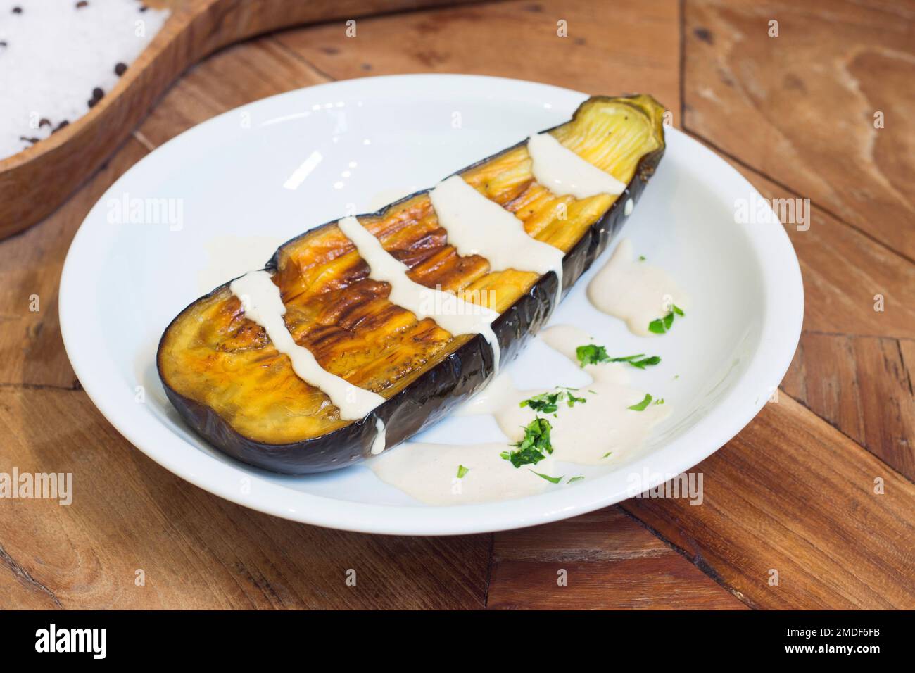 Baked eggplant with yogurt sauce traditional Arabic recipe Stock Photo ...