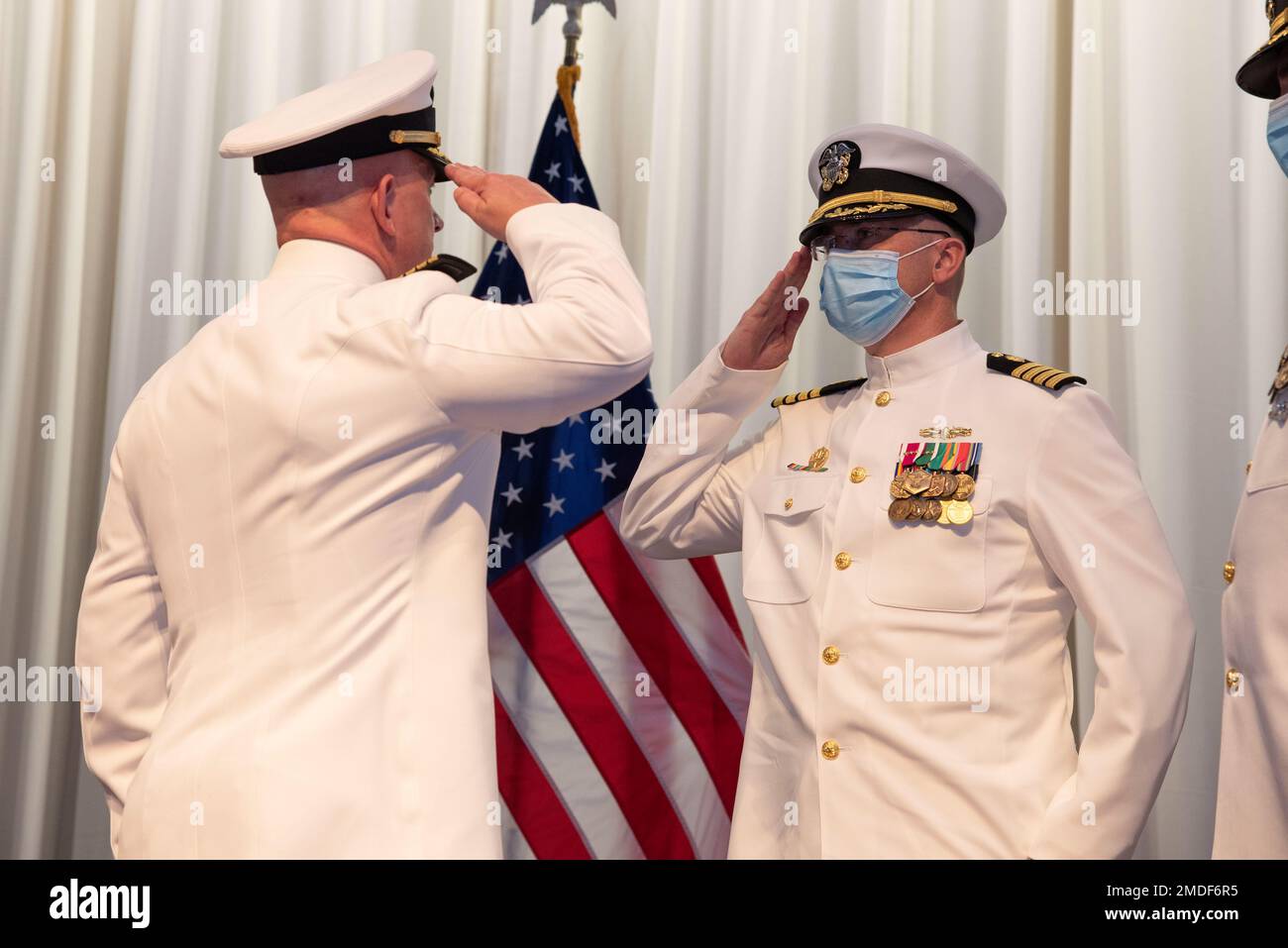 Cmdr. Jeffrey A. Delzer relieved Capt. Gerald F. Burke as officer-in ...