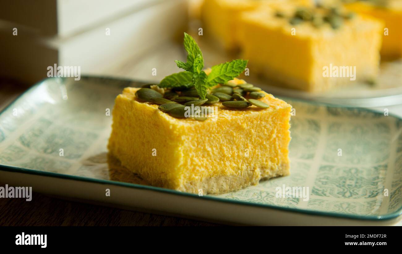 Pumpkin mousse with a biscuit base. Halloween dessert Stock Photo - Alamy