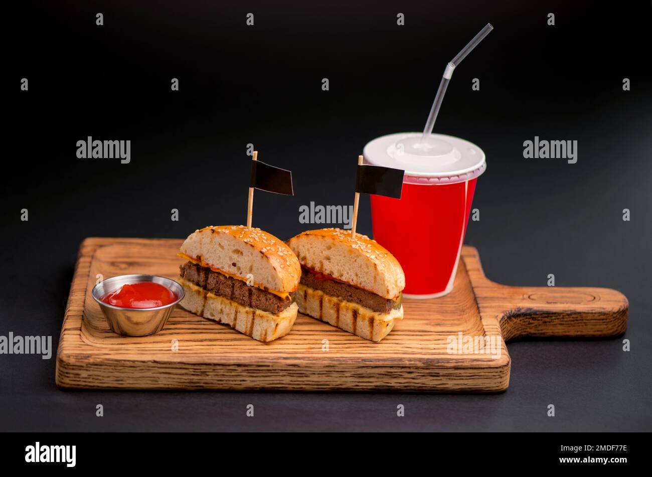 Classic burgers with becon, meat, cheese, onion, tomato and cheese and ...