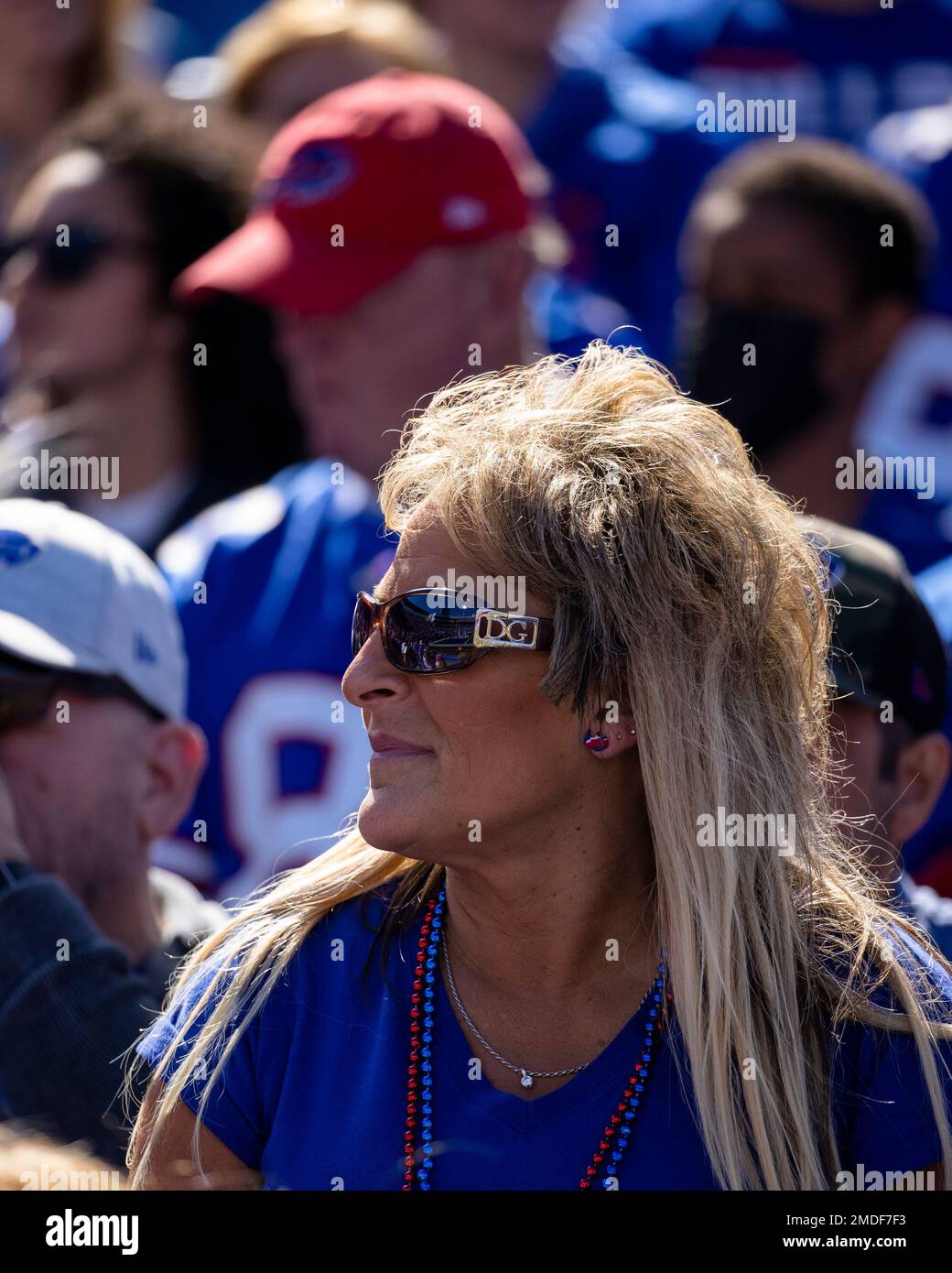 A Buffalo Bills fan watches warm ups before an NFL football game ...