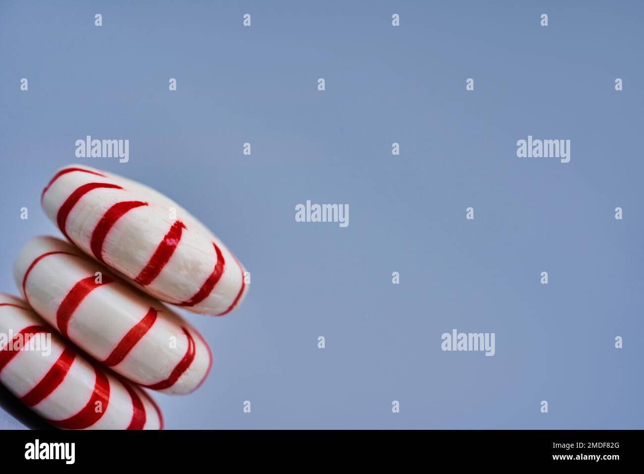 Fresh peppermint candy stacked hard candy light grey background Stock ...