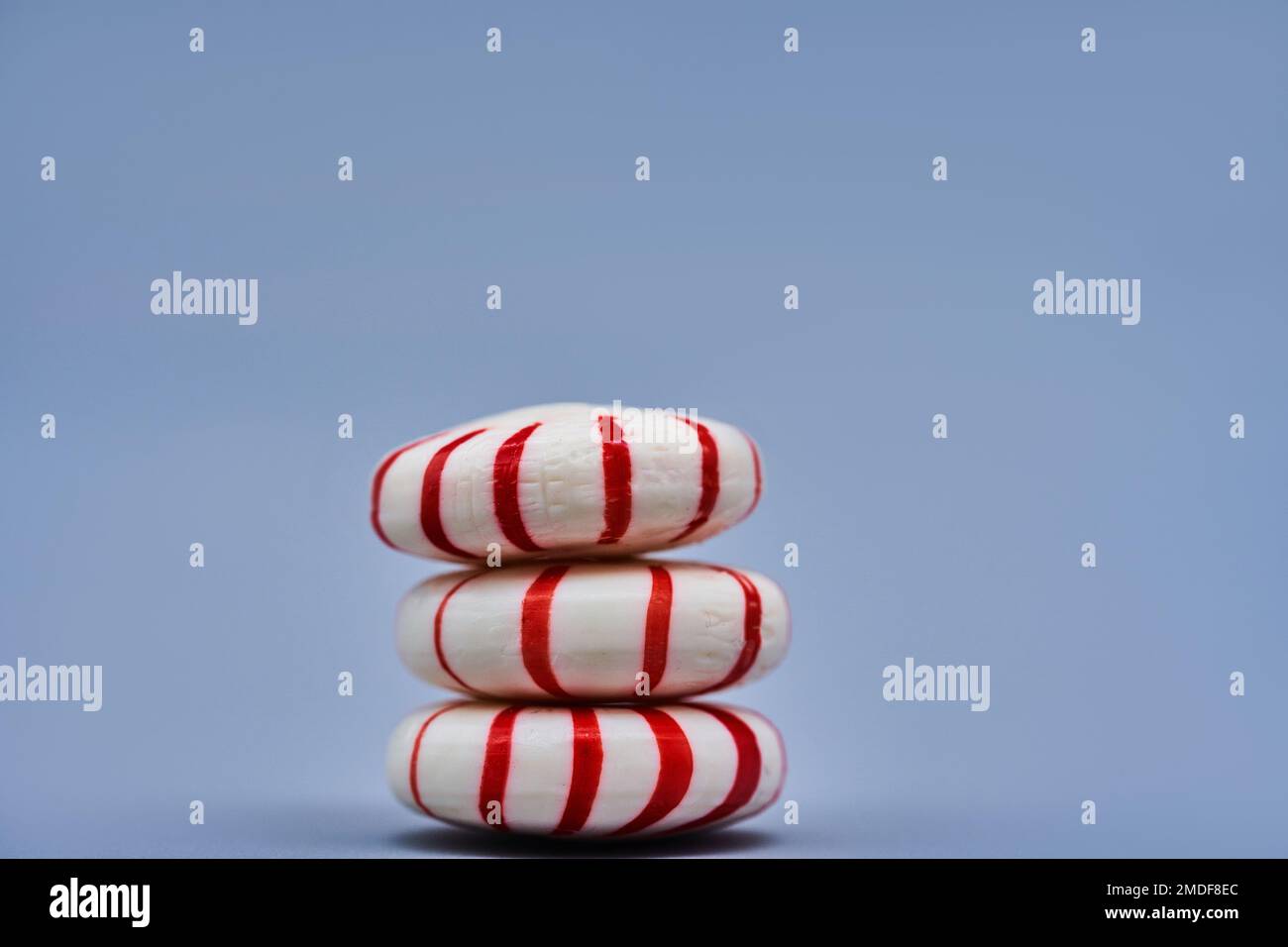 Fresh peppermint candy stacked hard candy light grey background Stock ...