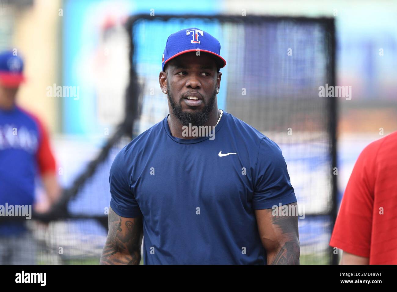 Texas Rangers' Adolis Garcia looks on during batting practice before a ...