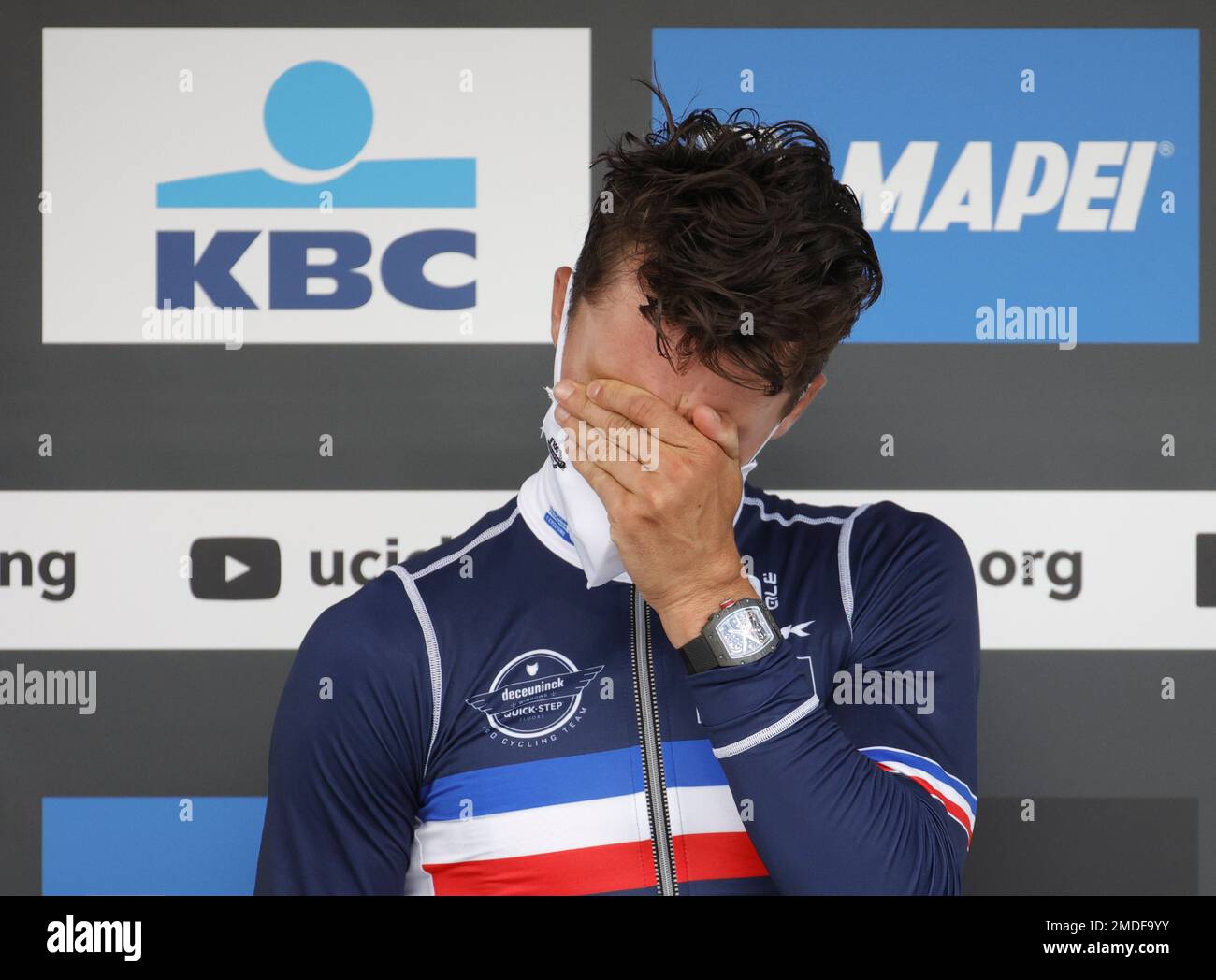 World champion Julian Alaphilippe of France is overcome with emotion ...
