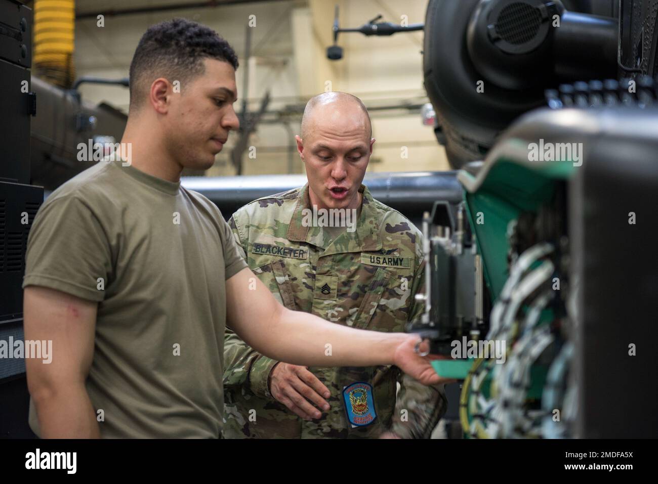U.S. Army Pvt. Cameron Guy (left), a student at the 128th Aviation ...