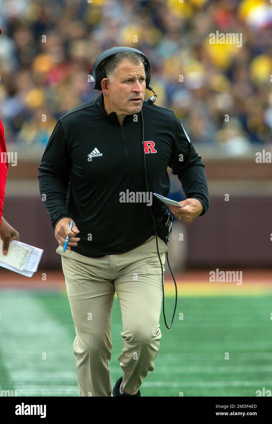 Rutgers head coach Greg Schiano follows the game from the sideline in ...