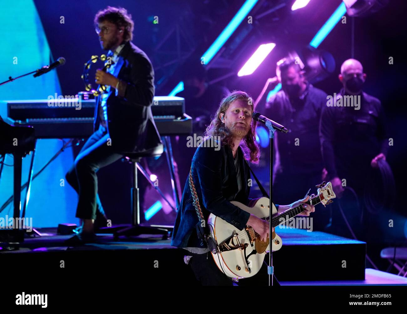 Wesley Schultz, right, of The Lumineers performs during the 2021 Global ...