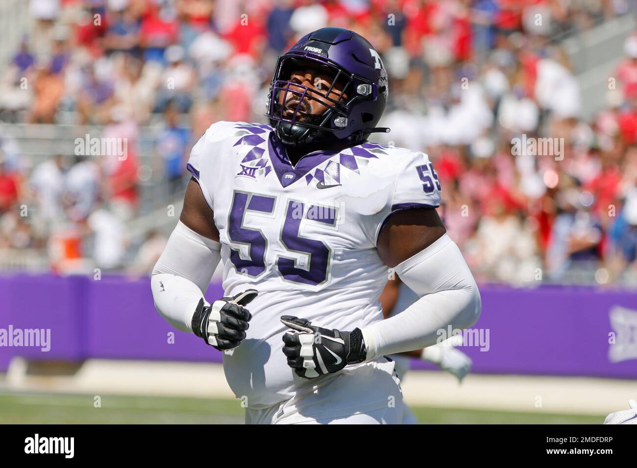 TCU Horned Frogs offensive tackle Obinna Eze (55) jogs off the field against SMU during the ...