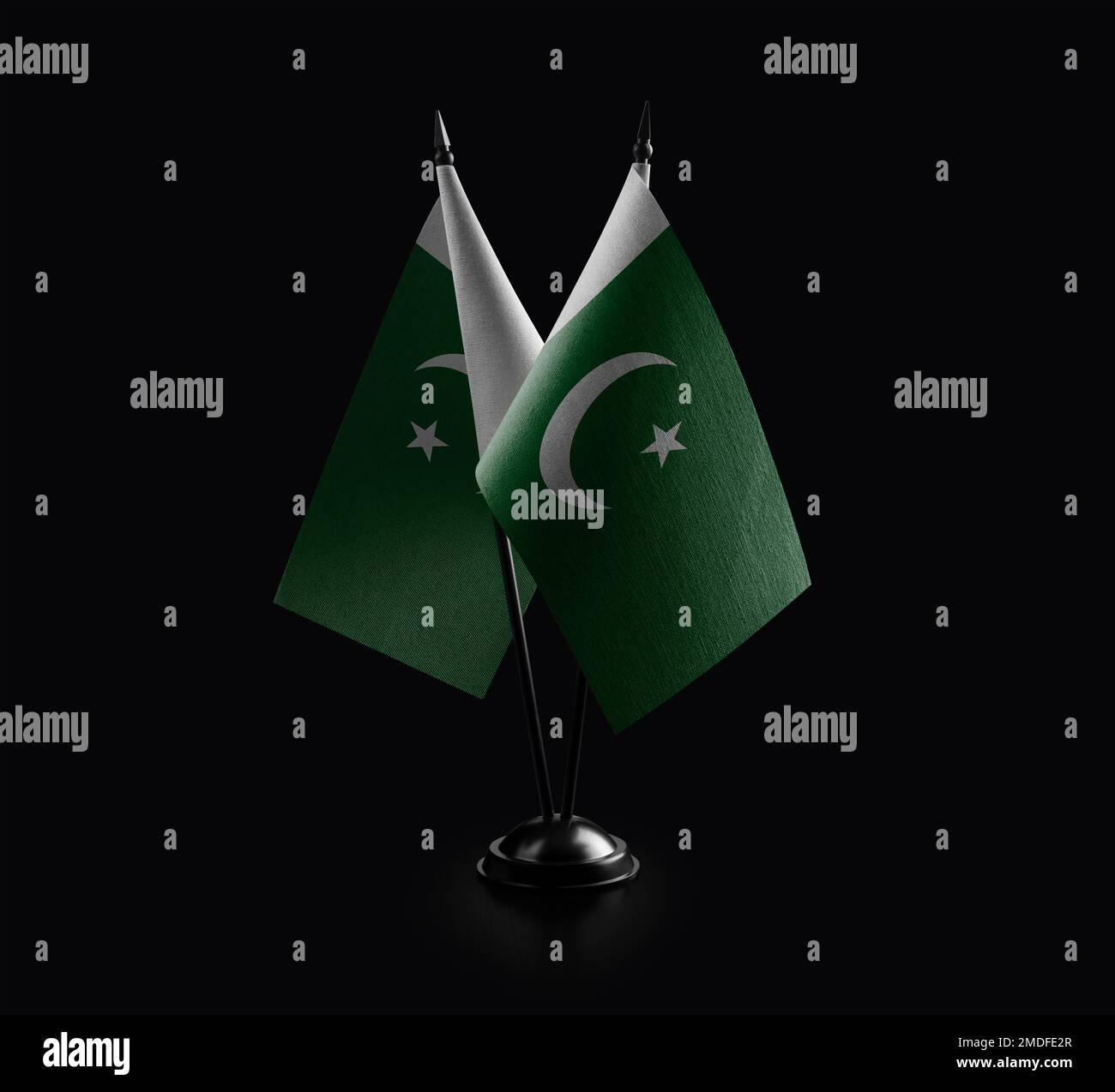 Small national flags of the Pakistan on a black background Stock Photo ...