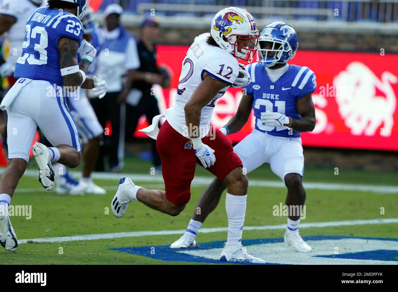 Kansas wide receiver Torry Locklin (12) scores a touchdown as Duke ...