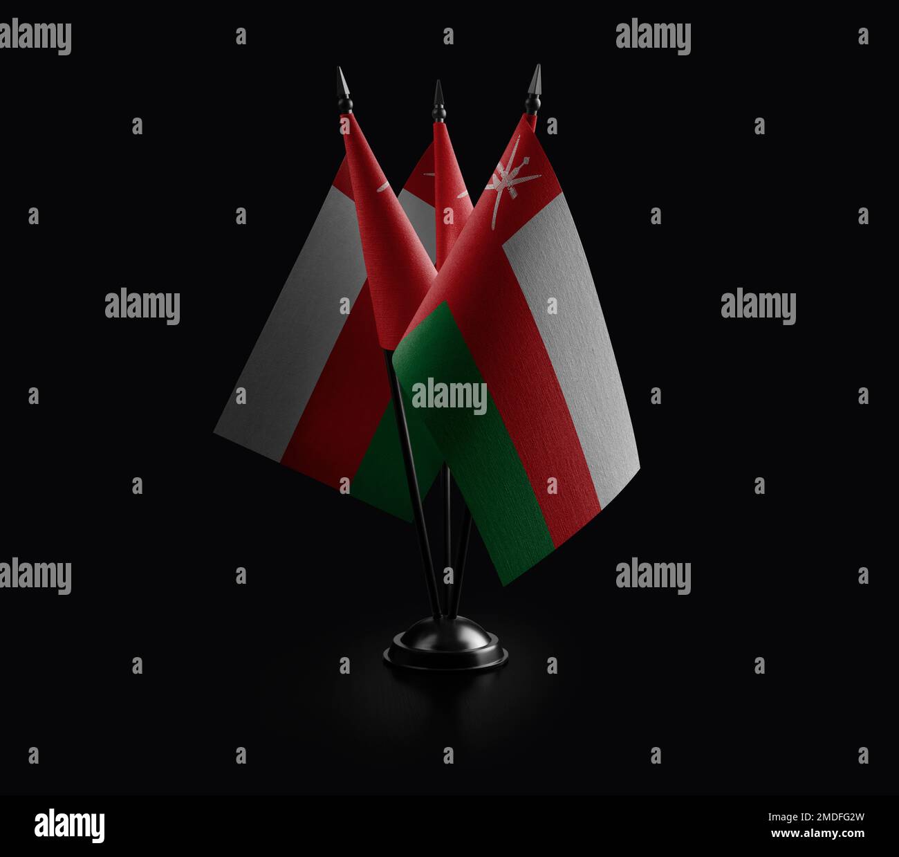 Small national flags of the Oman on a black background Stock Photo - Alamy