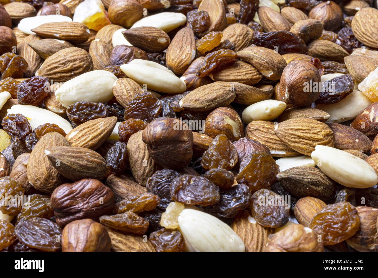 Mix of nuts and dried raisins Stock Photo - Alamy