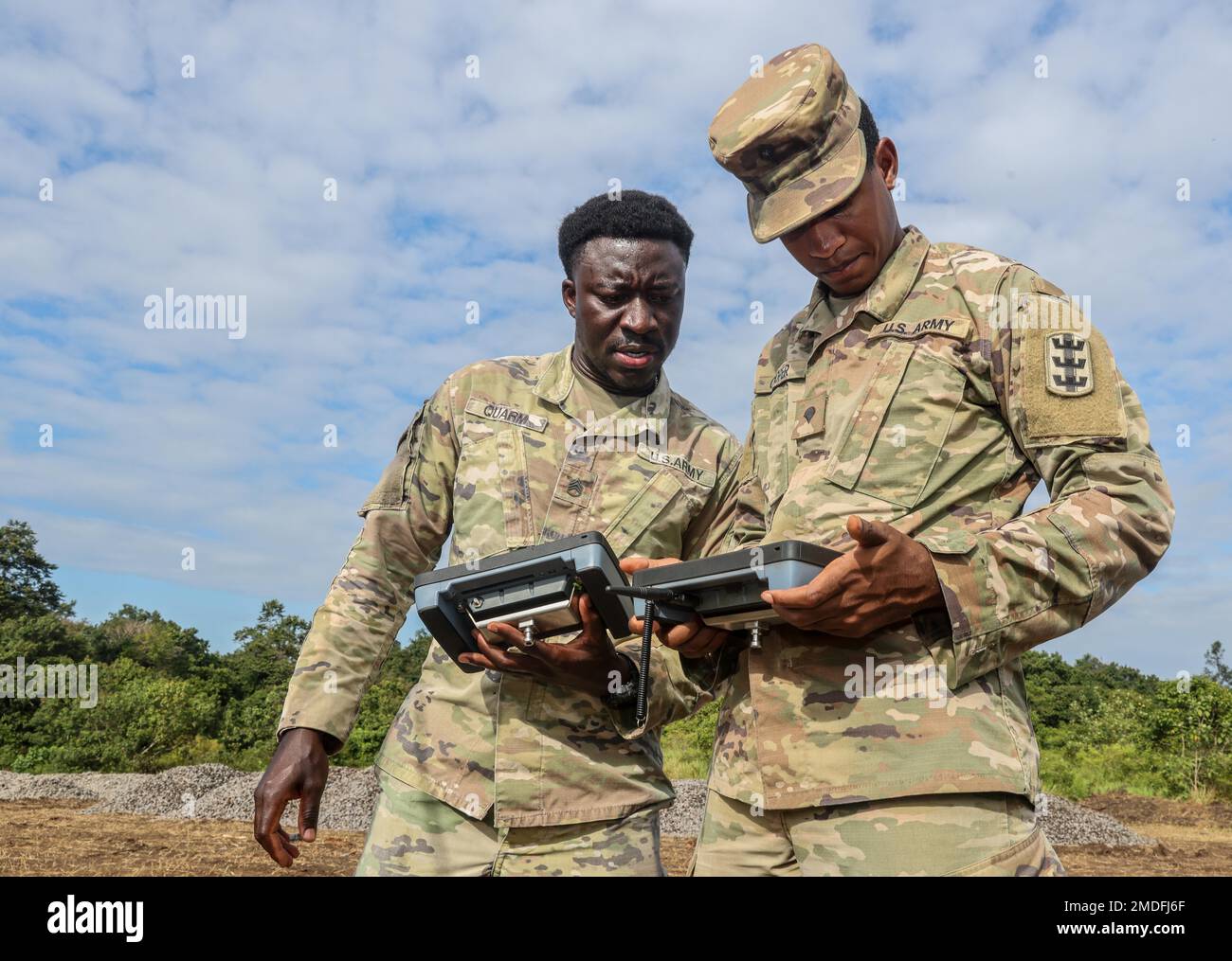 Staff Sgt. Michael Quarm and Spc. Damion Cooper from Headquarters and ...
