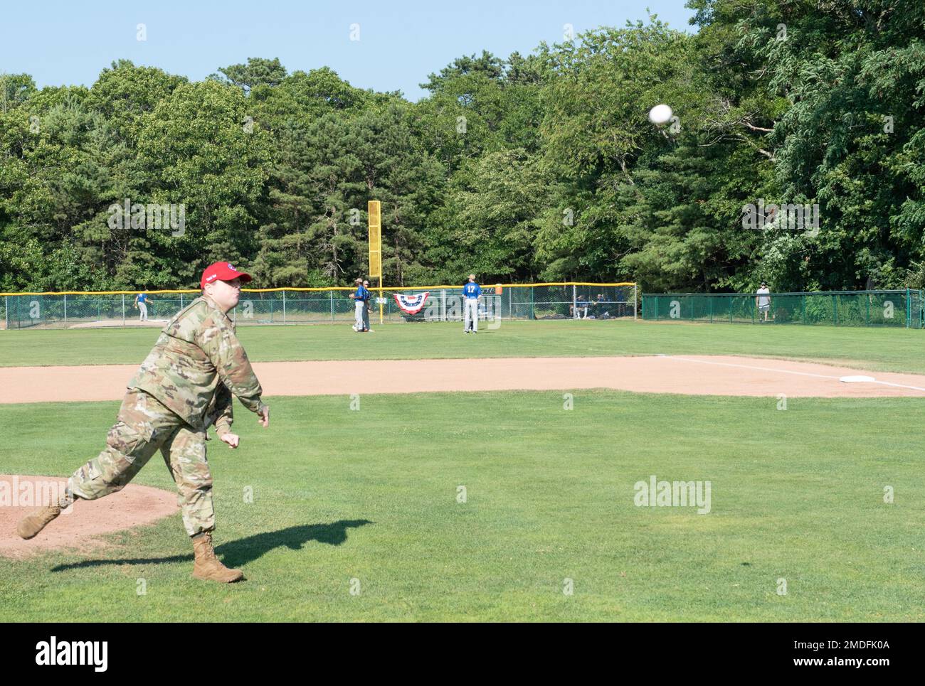 Staff Sgt. Jacob Hatcher throws out the first pitch at the Cotuit ...