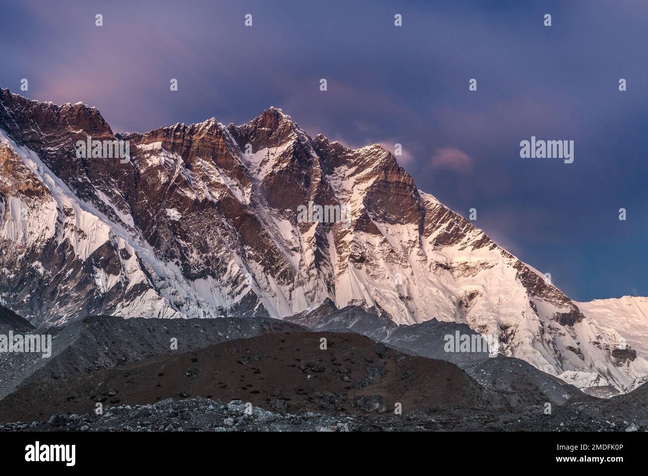 Beautiful sunset over purple Himalayan mountains on a clear day. Lhotse ...
